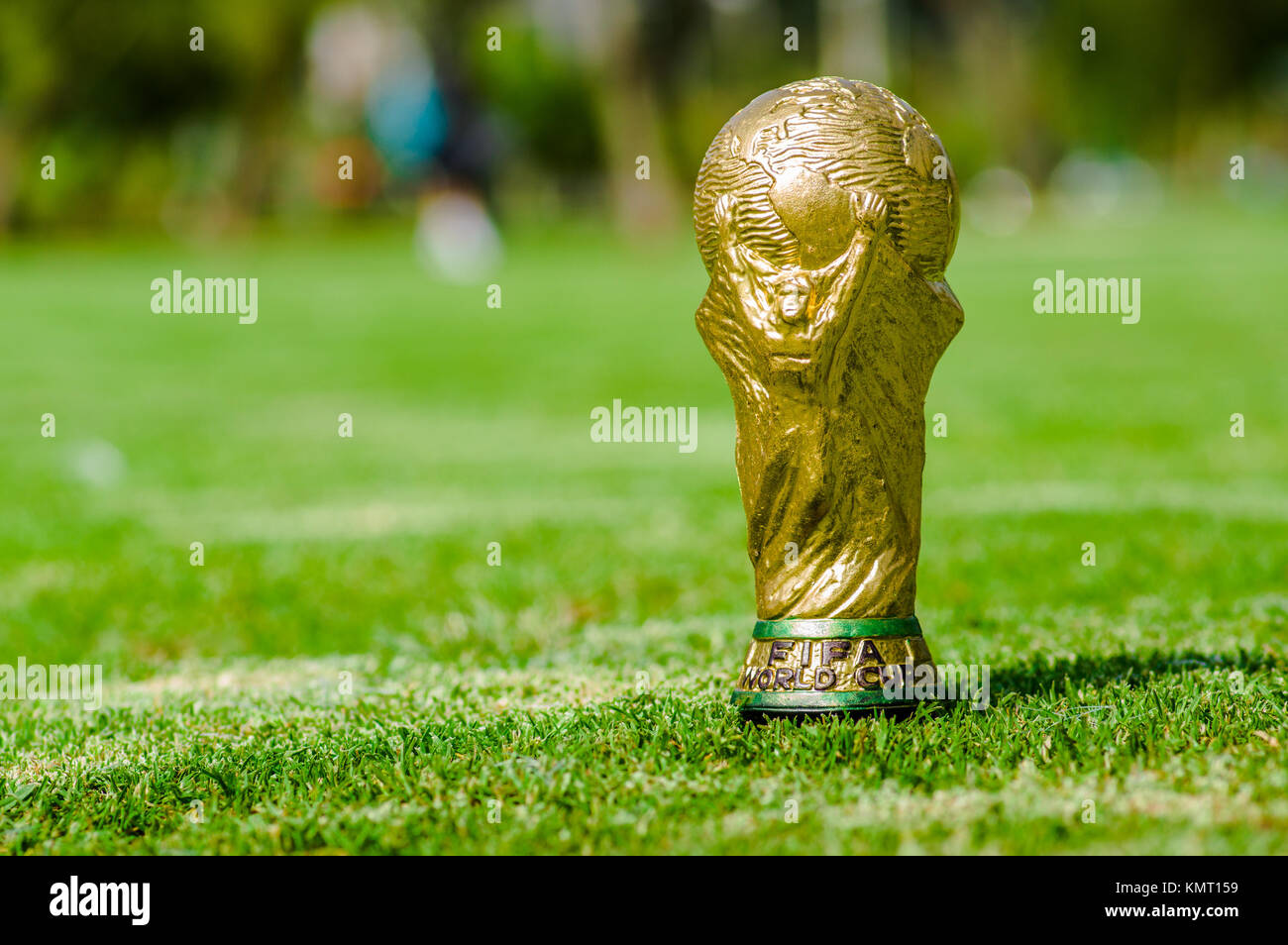 Close up of of fake golden trophy in the form of the globe in the park ...