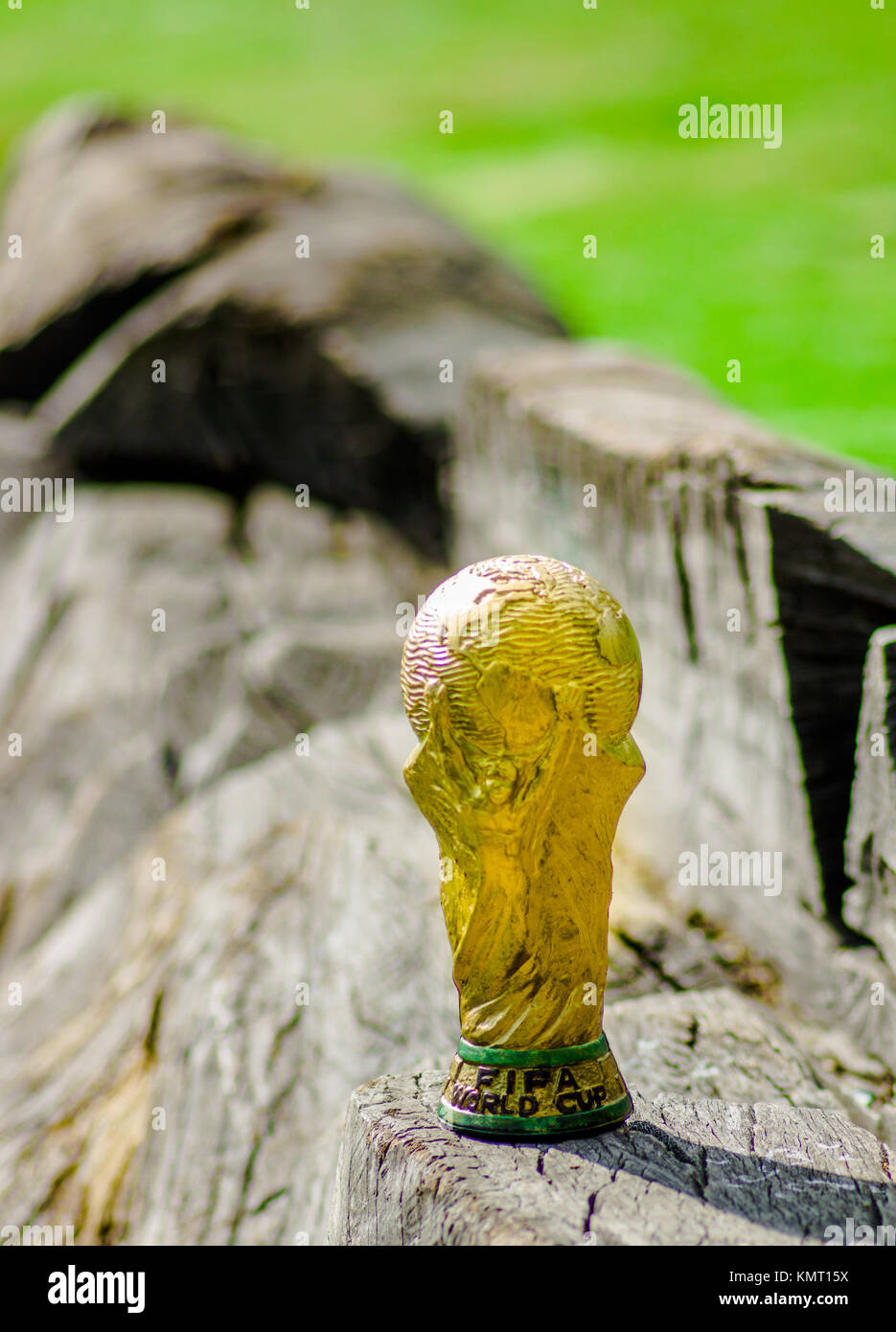 Close up of of fake golden trophy in the form of the globe, over a ...