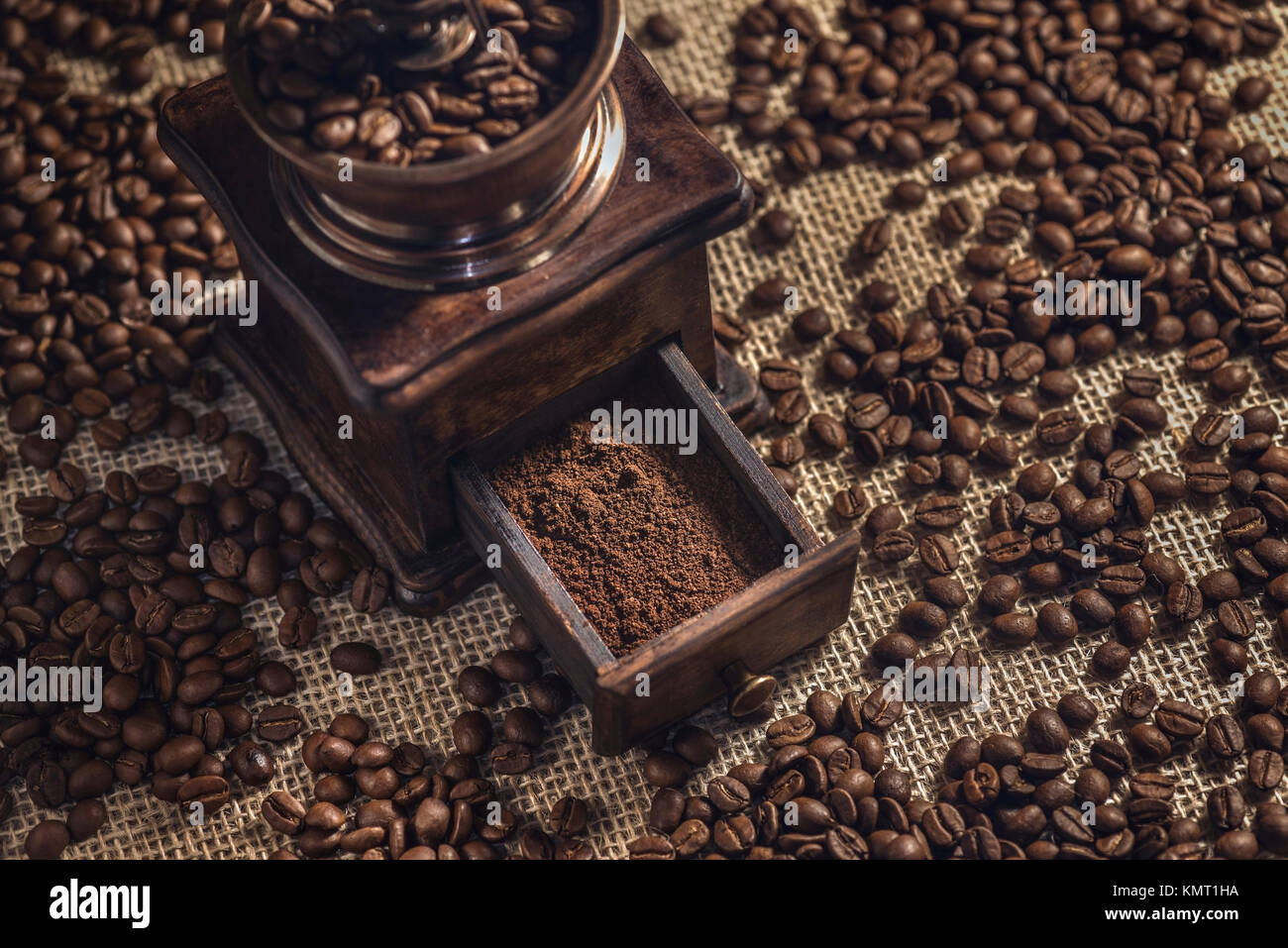 Coffee beans and grinder,high angle Stock Photo - Alamy