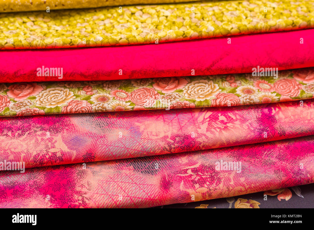 Close up of different fabric of different colors, fabric waiting for ...
