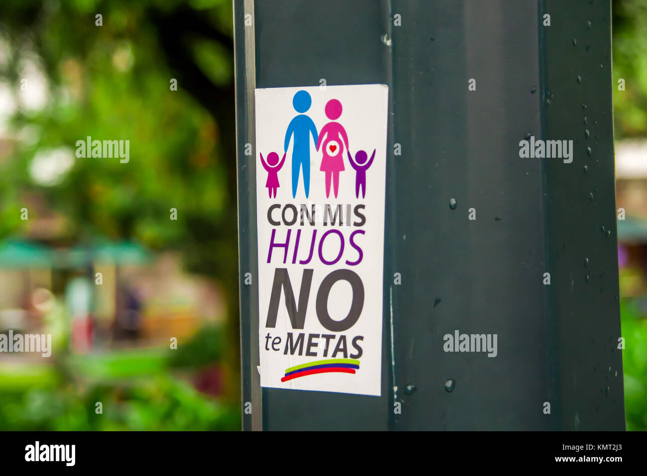 QUITO, ECUADOR NOVEMBER, 28, 2017: Informative sign over a green ...
