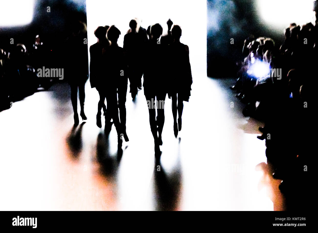 Silhouette of a group of models with a movement effect at the end of ...