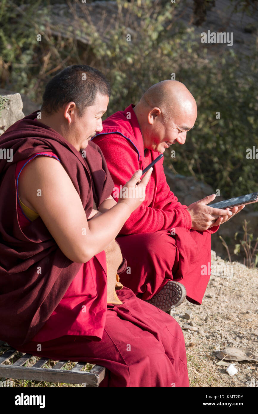 Tibetan monks using smart phones Stock Photo - Alamy