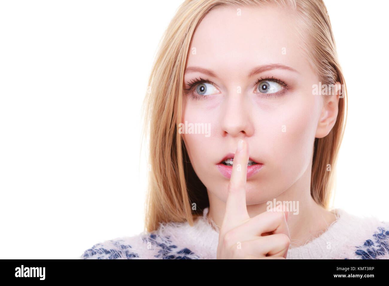 Gestures and signs concept. Young blonde woman making silence gesture ...