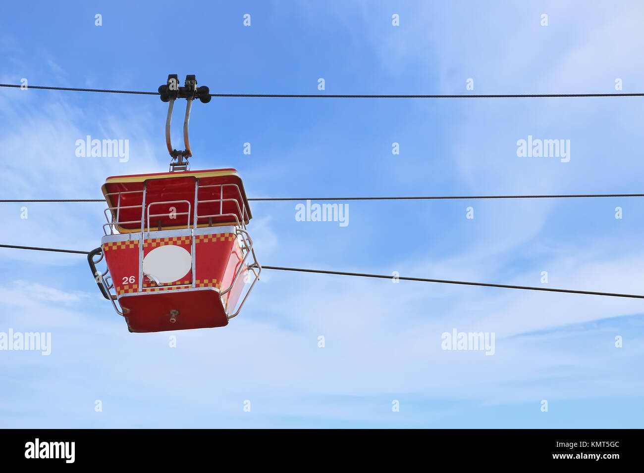Red cable car with blue sky background Stock Photo - Alamy