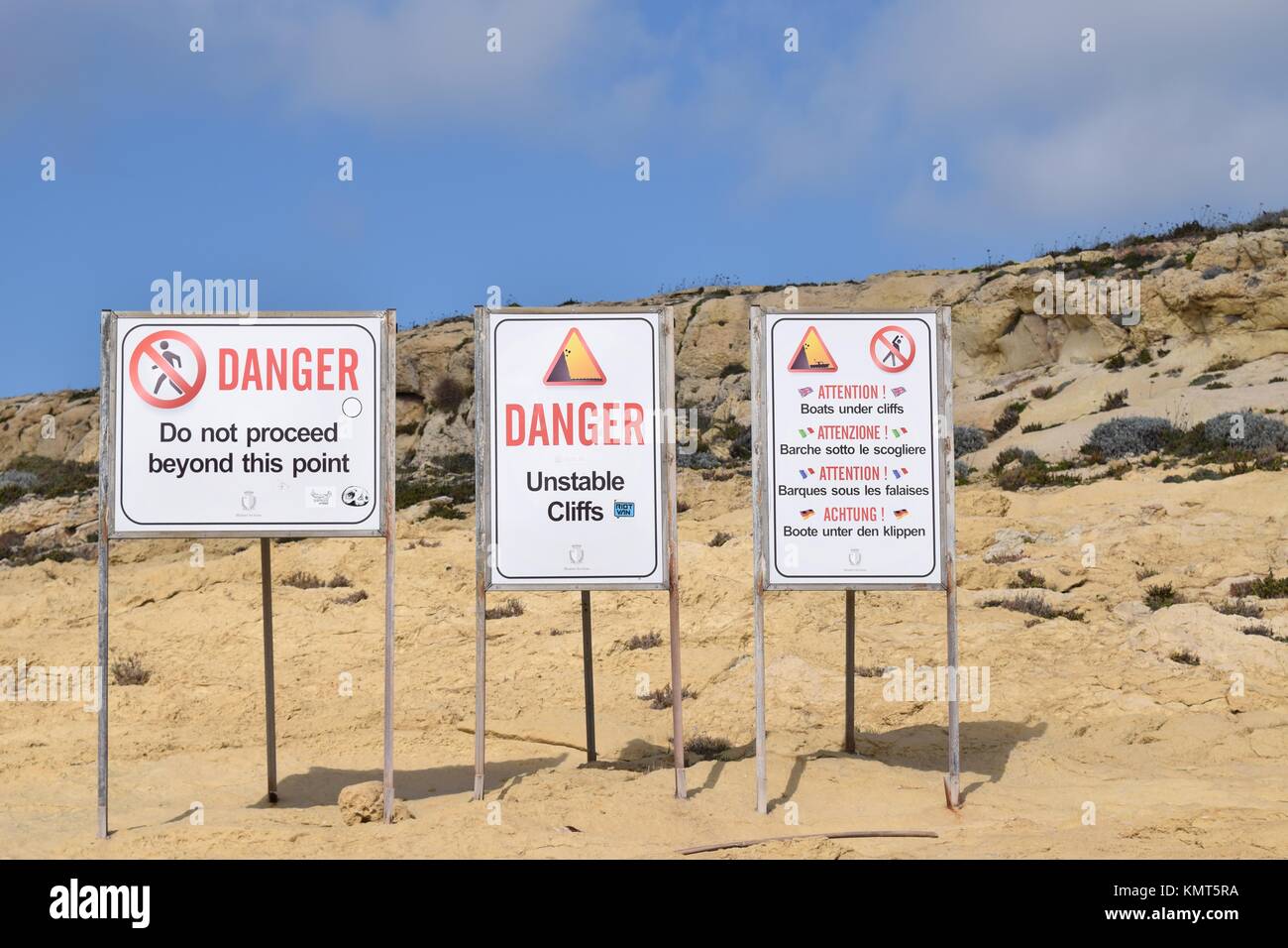 Danger signs on a cliff Stock Photo - Alamy