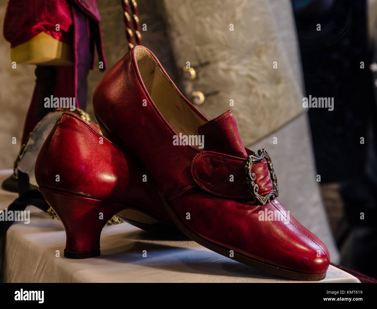 details of red shoes in venetian style for the traditional carnival in ...