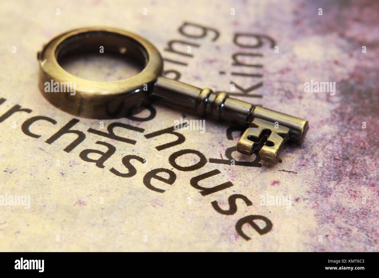 Old key on house text Stock Photo - Alamy