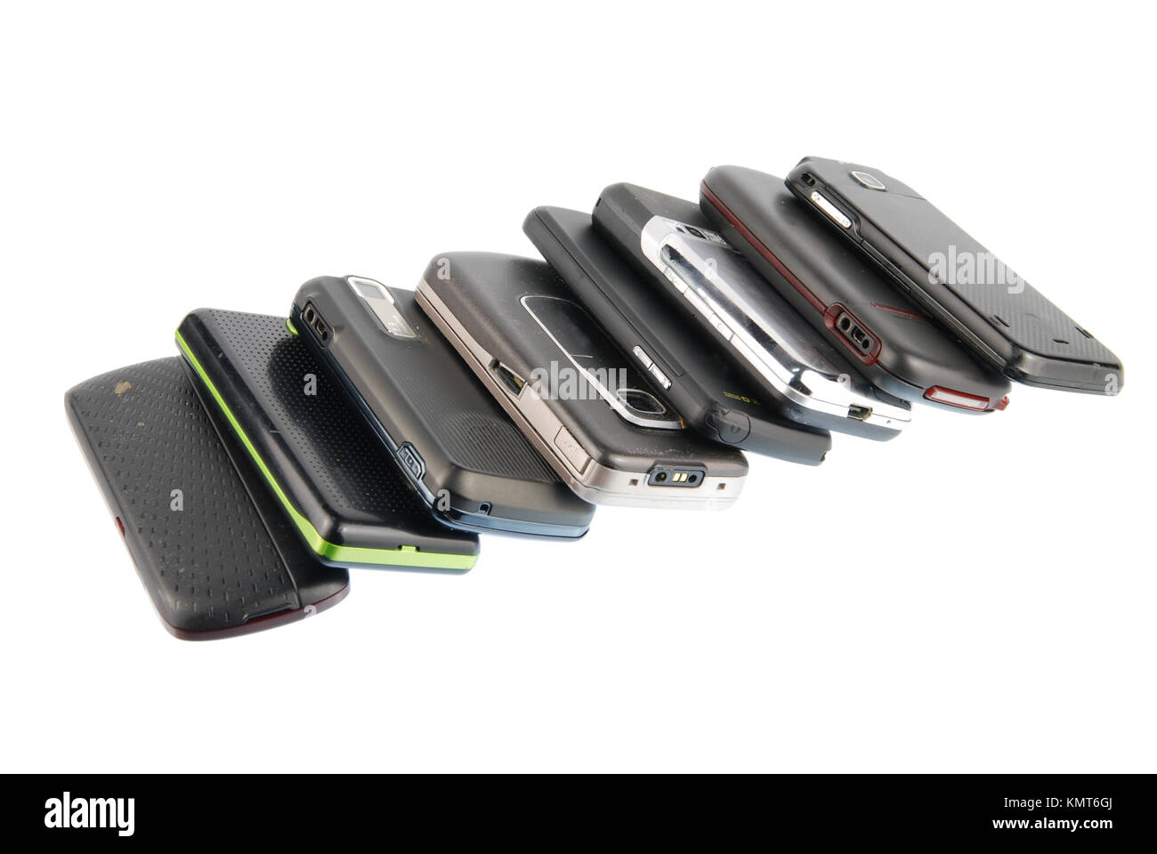 row of several mobile phones isolated on white background Stock Photo ...