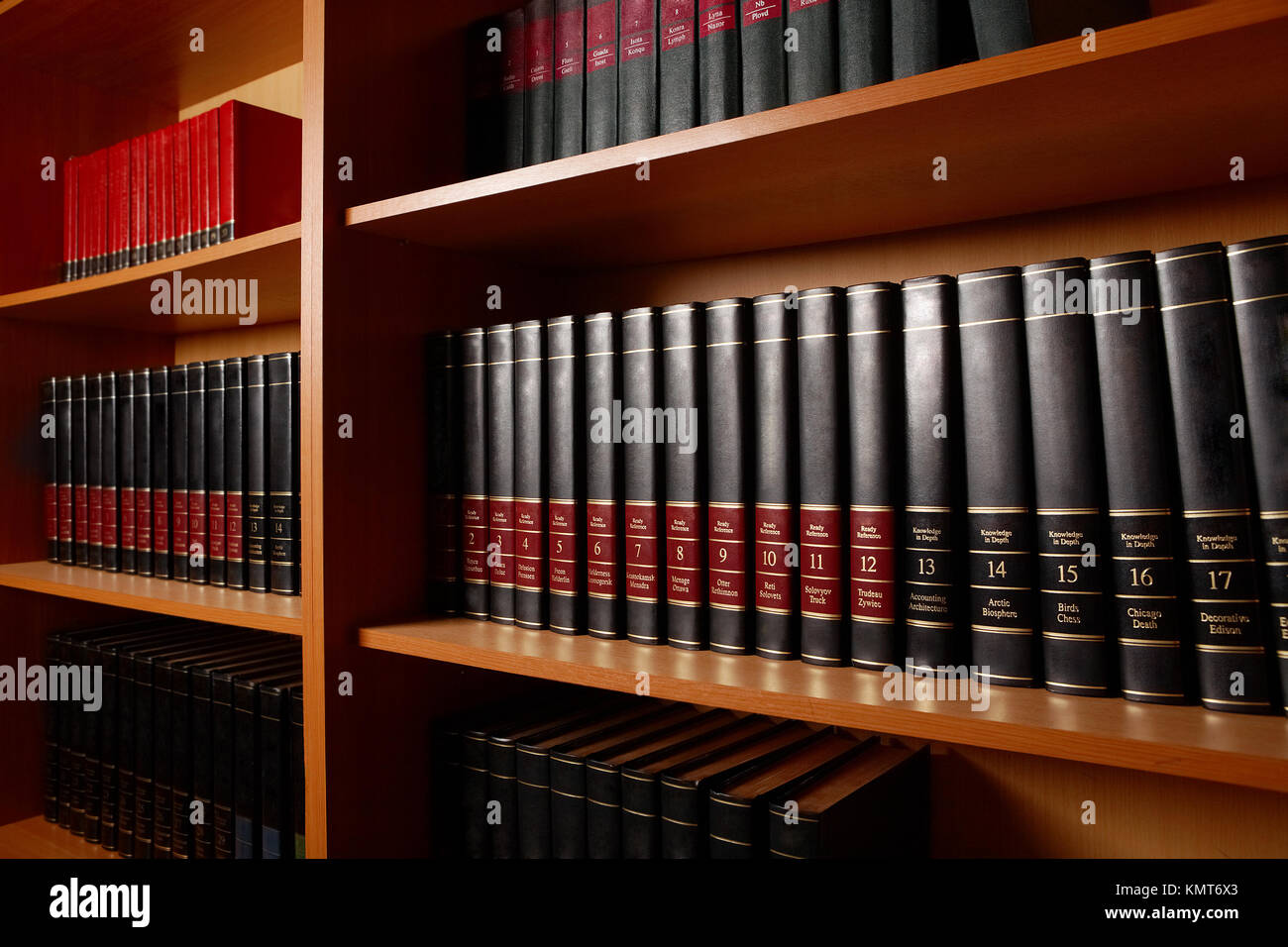 Photo of shelves with books in big library of educational institution ...