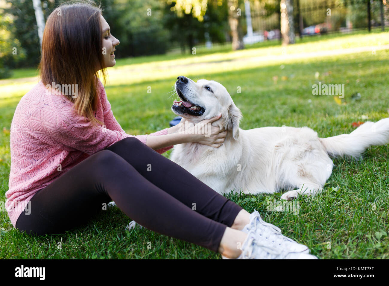 Picture of girl hugging labrador Stock Photo - Alamy