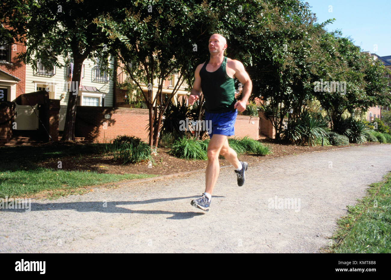Man, 40-45, running outside Stock Photo - Alamy