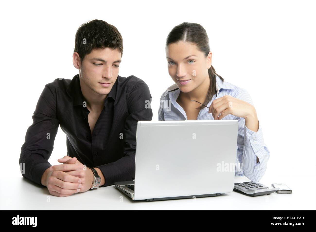 Young couple teamwork cooperation, white table with laptop Stock Photo ...