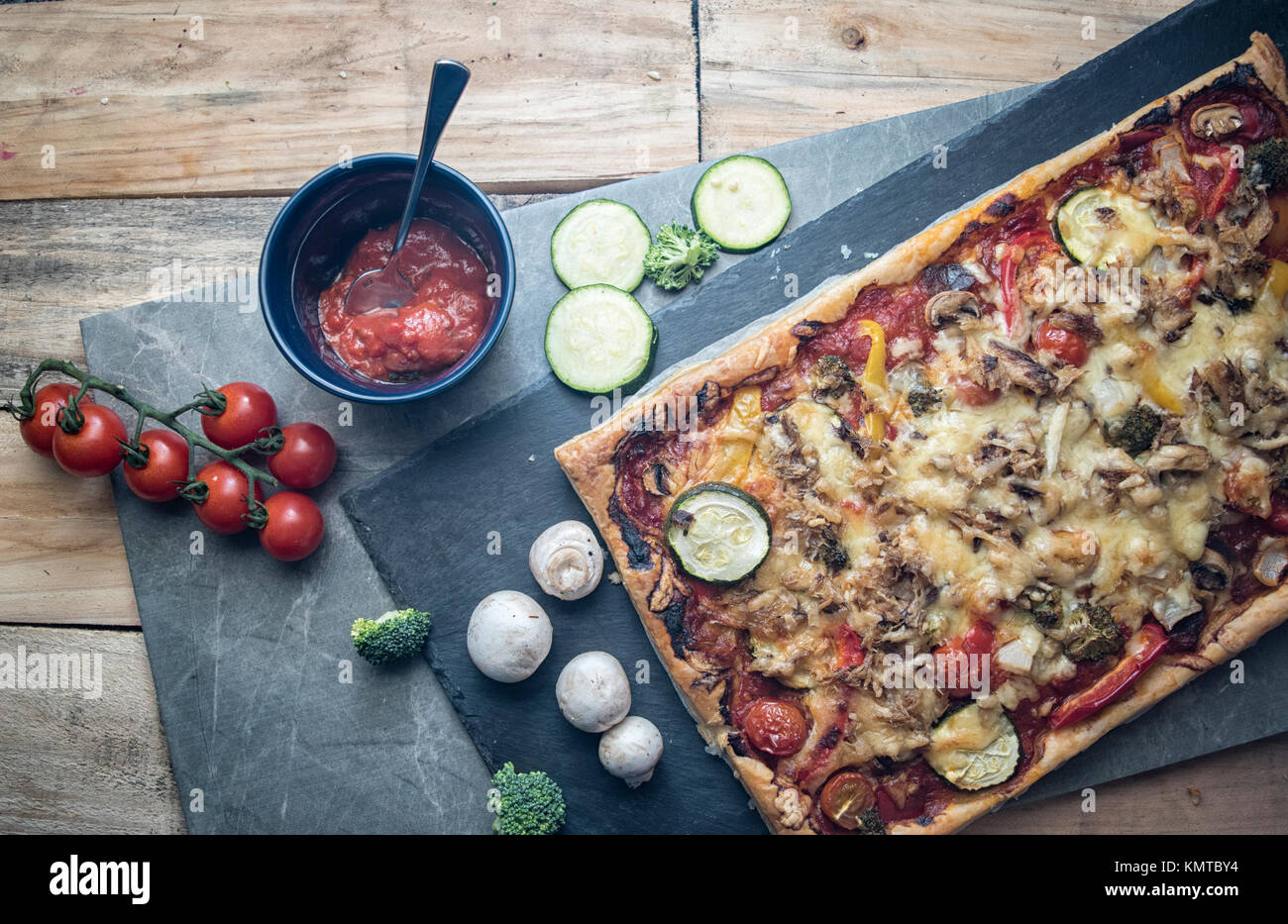 Homecooked Vegetable Pizza on Slate Stock Photo - Alamy