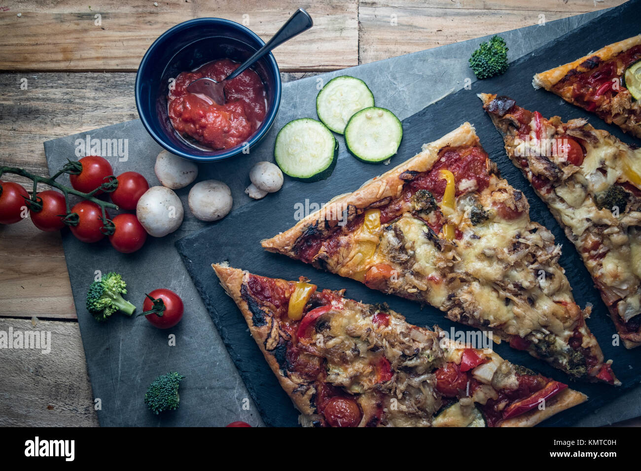 Homecooked Vegetable Pizza on Slate Stock Photo - Alamy