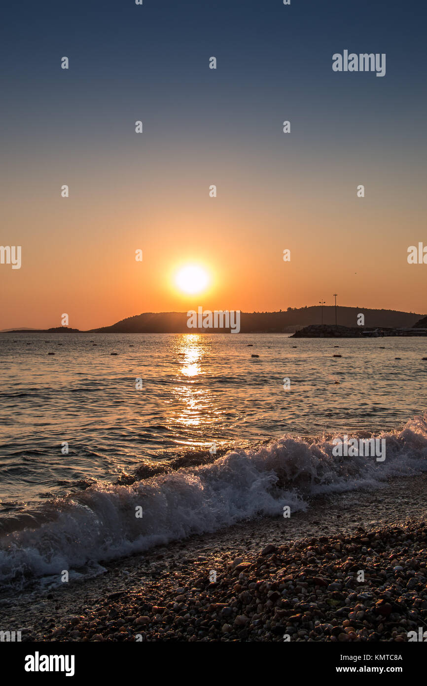 Sunset and waves at the beach of the Turkish sea Stock Photo - Alamy