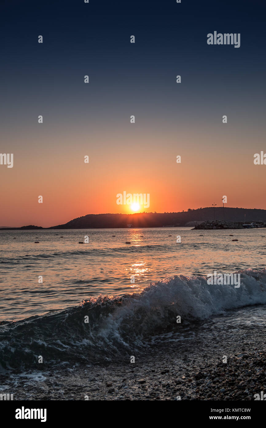 Sunset and waves at the beach of the Turkish sea Stock Photo - Alamy