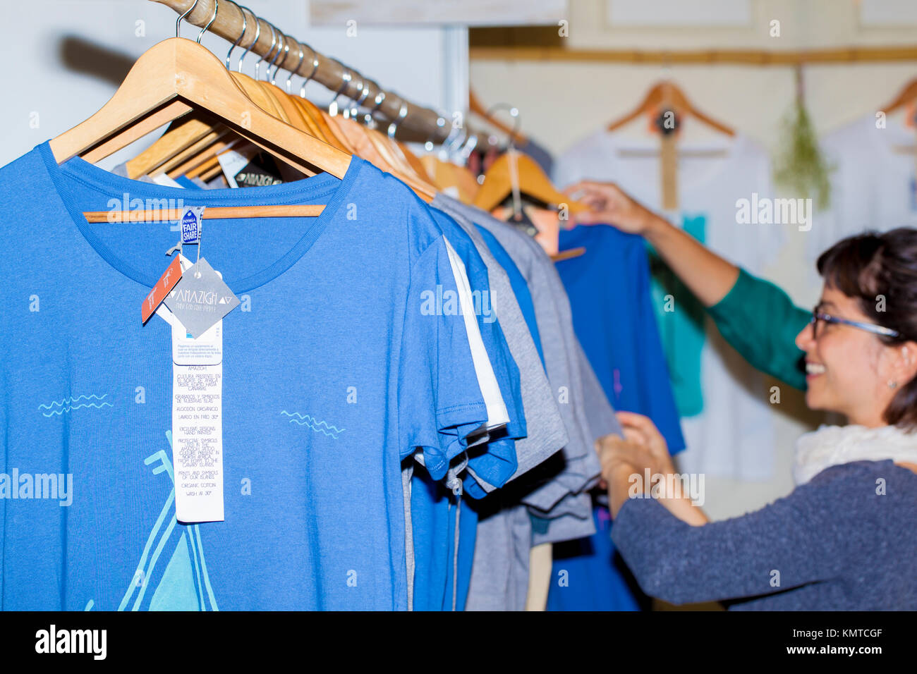 Hanging shirts blur hi-res stock photography and images - Alamy