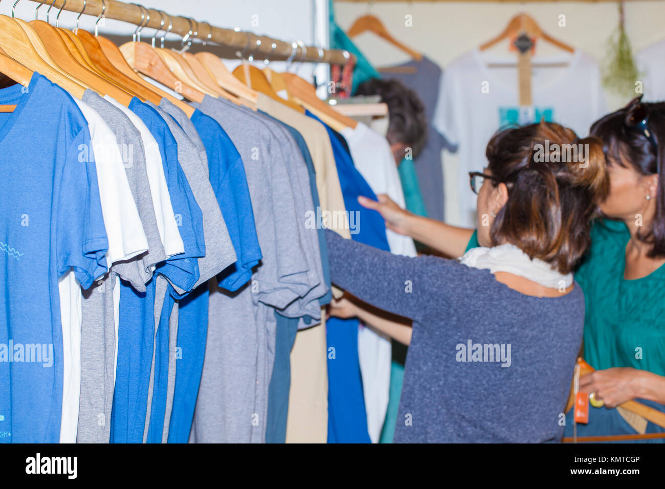 Hanging shirts blur hi-res stock photography and images - Alamy