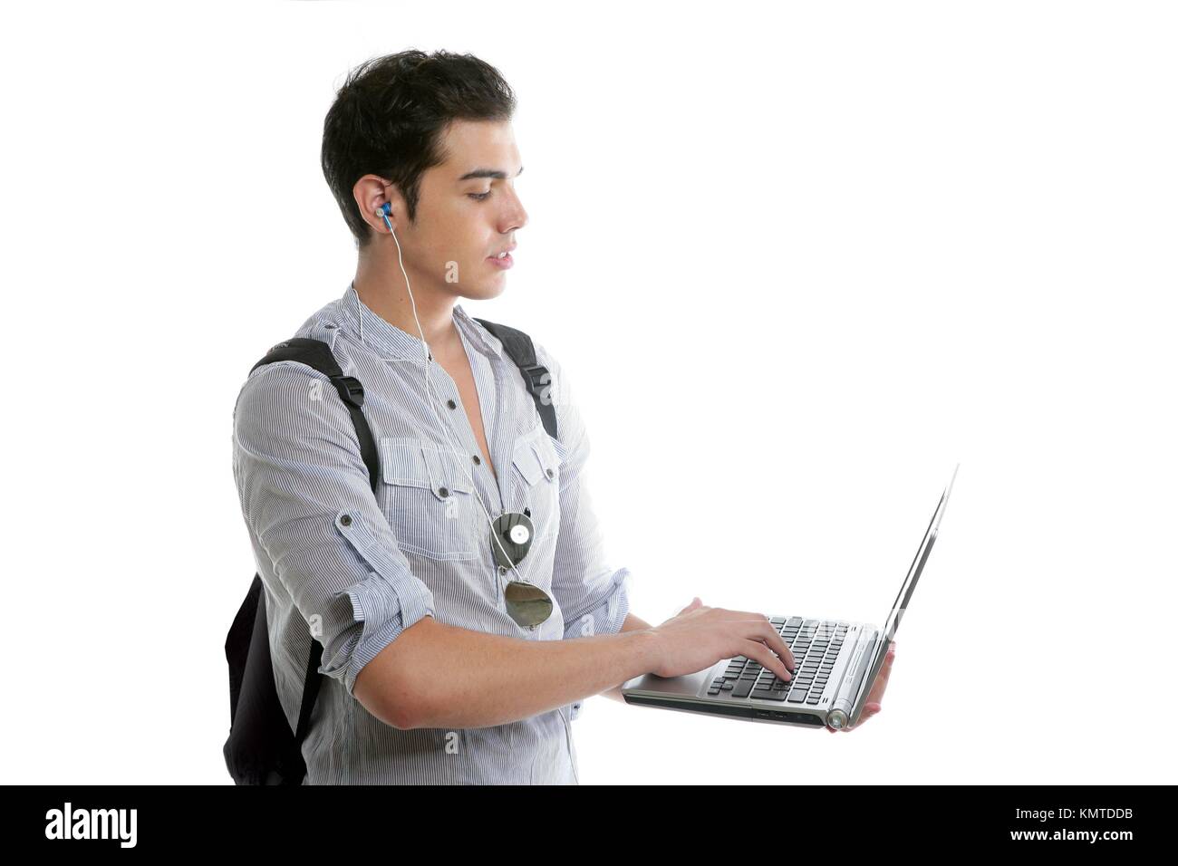 Male young student homework with laptop computer isolated on white ...