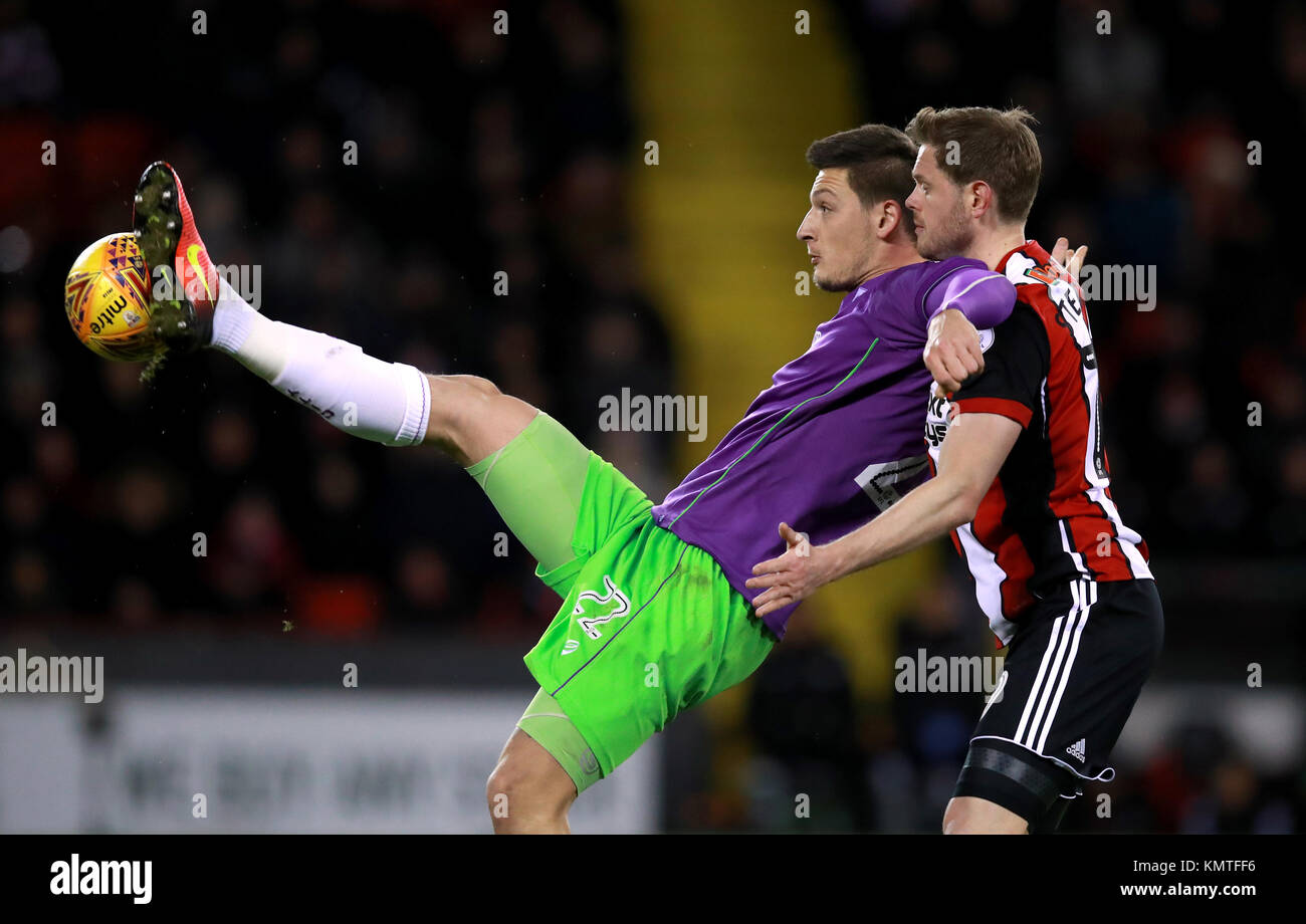 Bristol City's Milan Duric (left) and Sheffield United's Richard ...