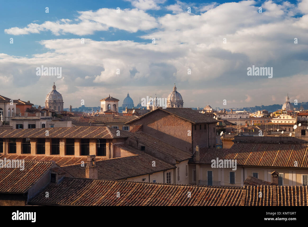 Rome historic center skyline with old domes and clouds at sunset, seen ...