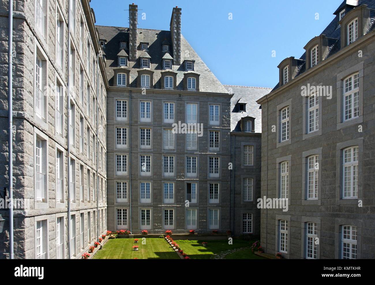 A classic french buildings with garden Stock Photo - Alamy