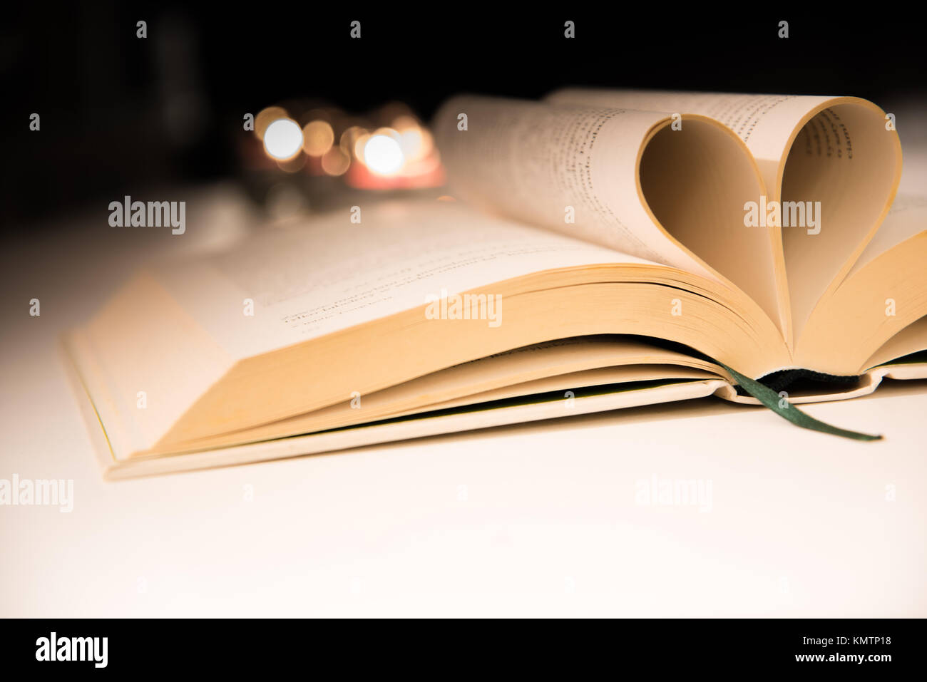 Bible pages heart hi-res stock photography and images - Alamy