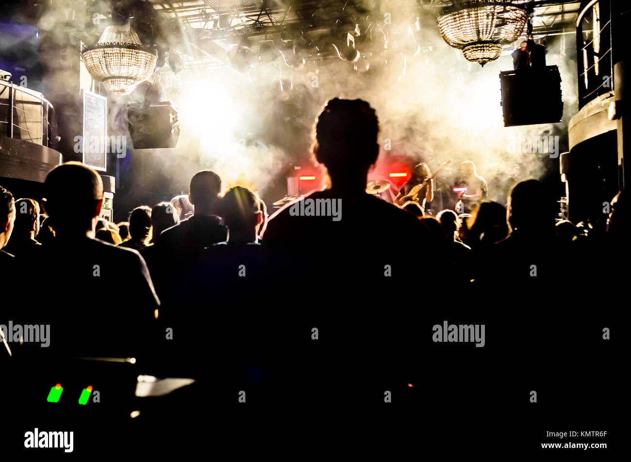 Rock band and fans during concert Stock Photo - Alamy