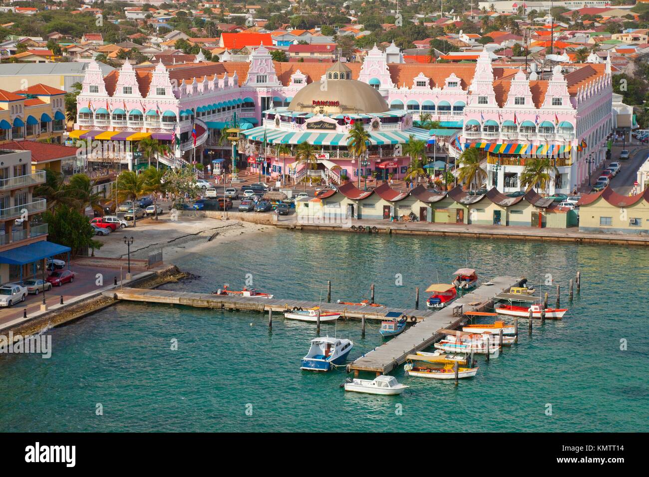 The marina and port of Aruba with dutch architecture from and elevated ...