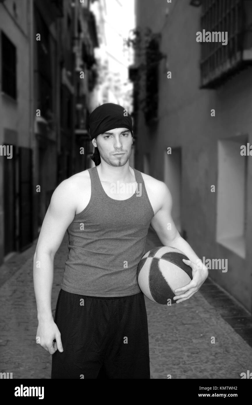 Playing basketball man town hi-res stock photography and images - Alamy