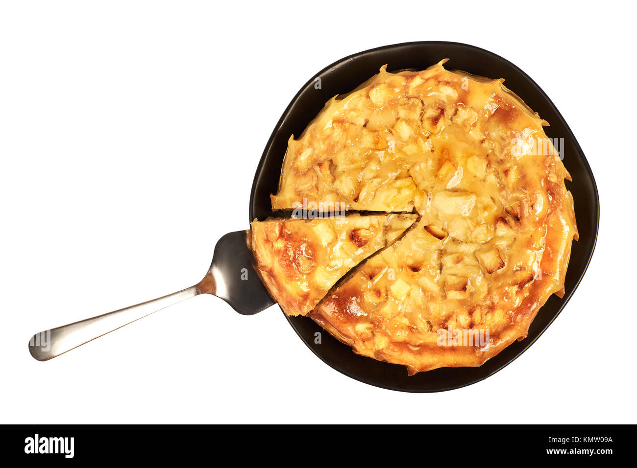 Homemade whole round apple pie, top view. A piece can be taken out on a ...