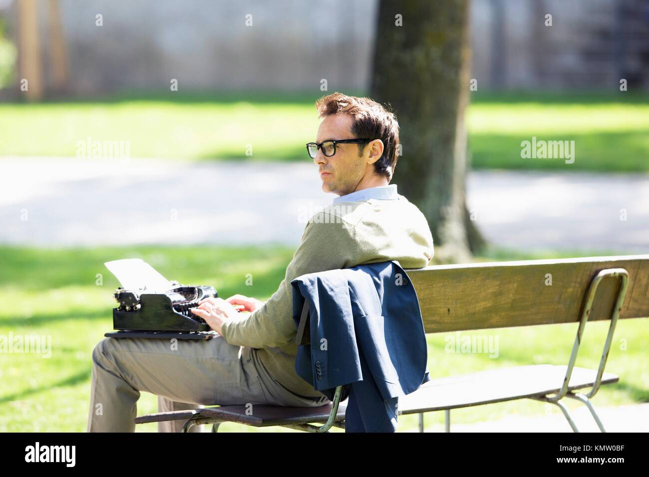 Man on old fashioned typewriter hi-res stock photography and images - Alamy