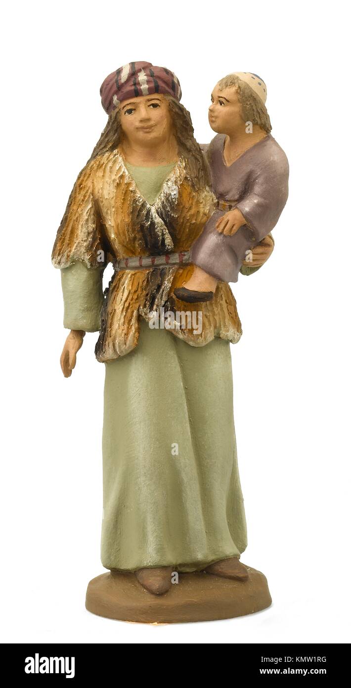 Nativity figures Woman and children Stock Photo - Alamy