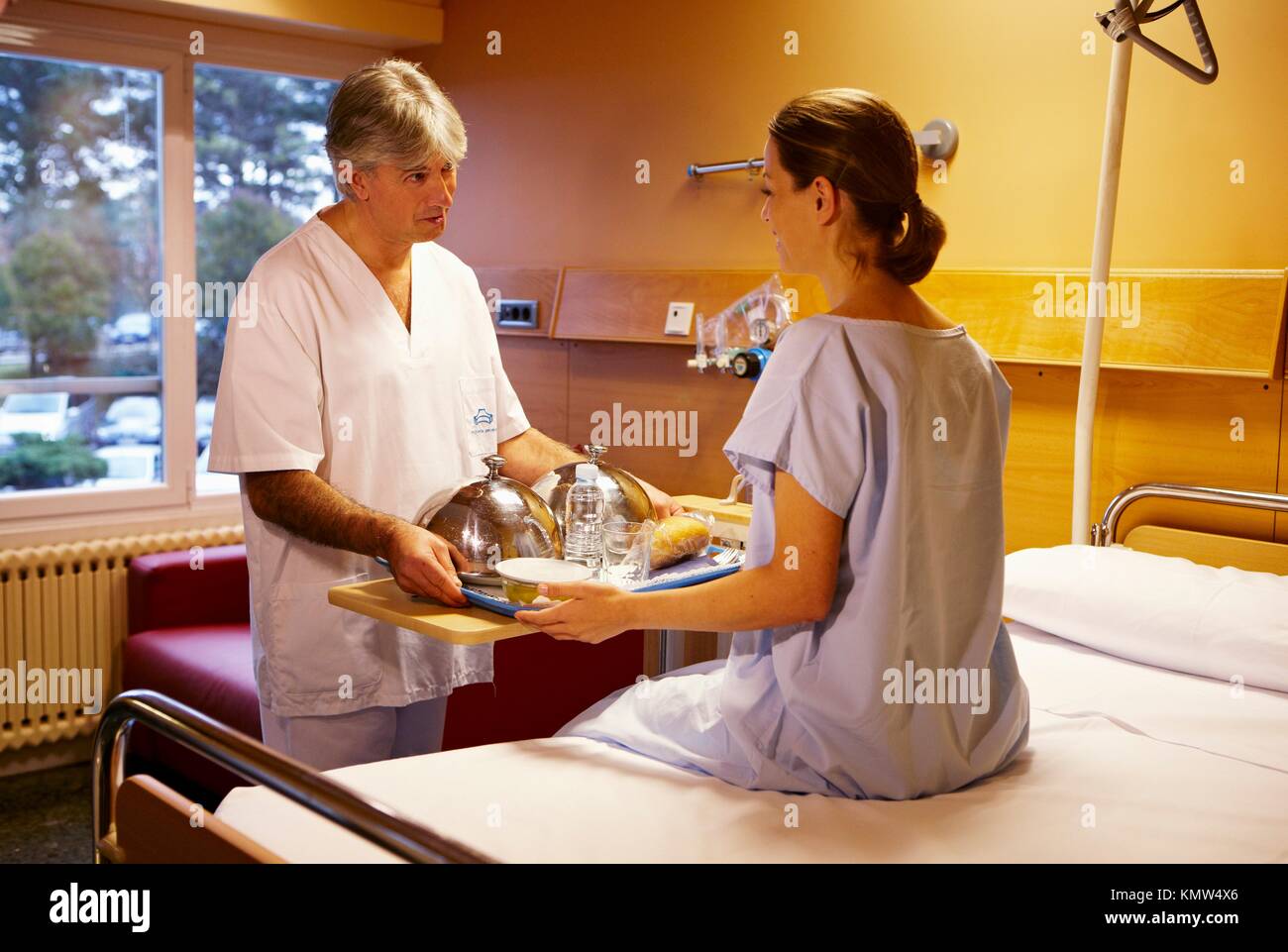 Female Nurse Serving Food Patient High Resolution Stock Photography and ...