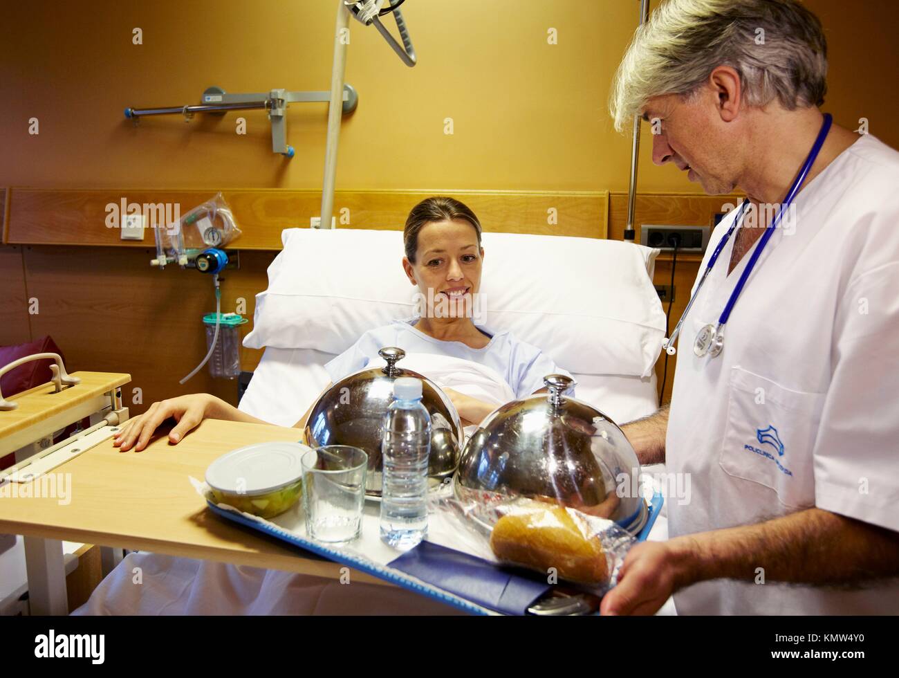 Female Nurse Serving Food Patient High Resolution Stock Photography and ...