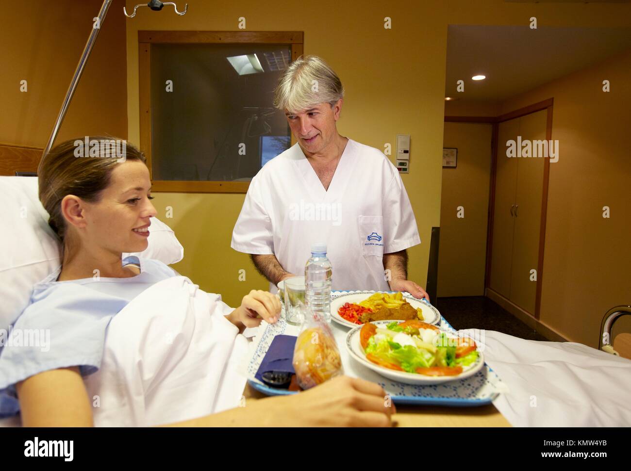 Female Nurse Serving Food Patient High Resolution Stock Photography and ...