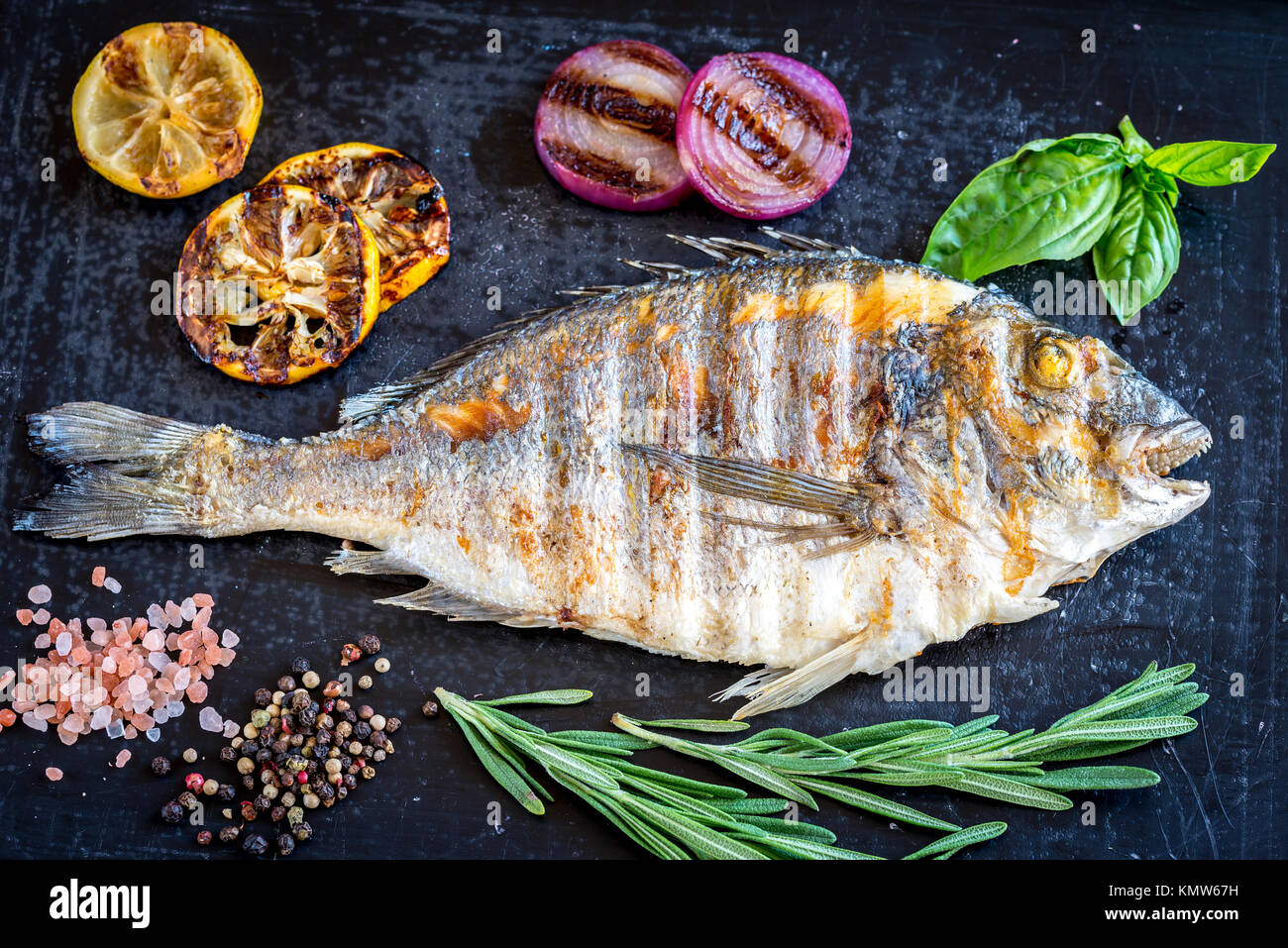 Grilled dorada fish Stock Photo - Alamy