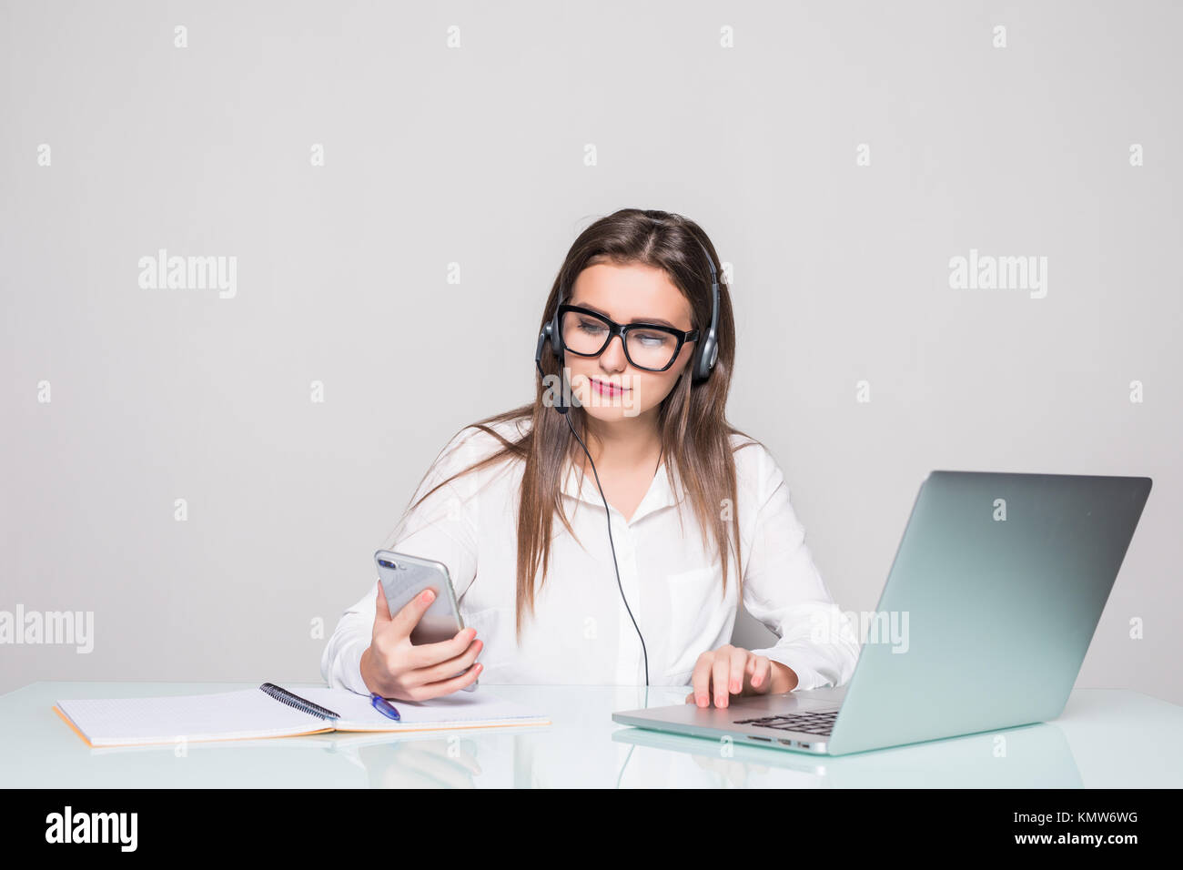 picture of helpline operator with laptop computer Stock Photo - Alamy