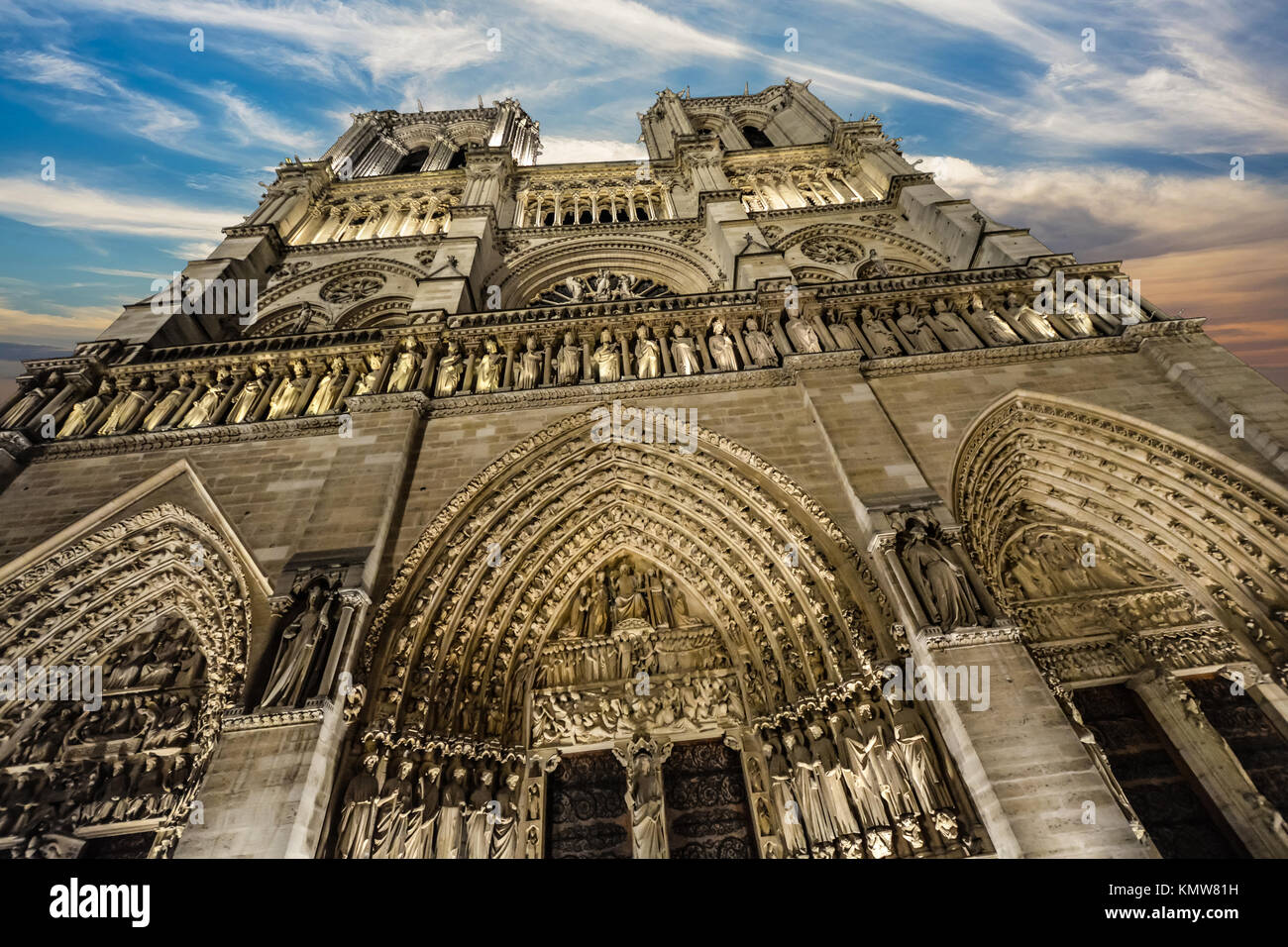 The front facade of Notre Dame Cathedral in Paris France, looking ...