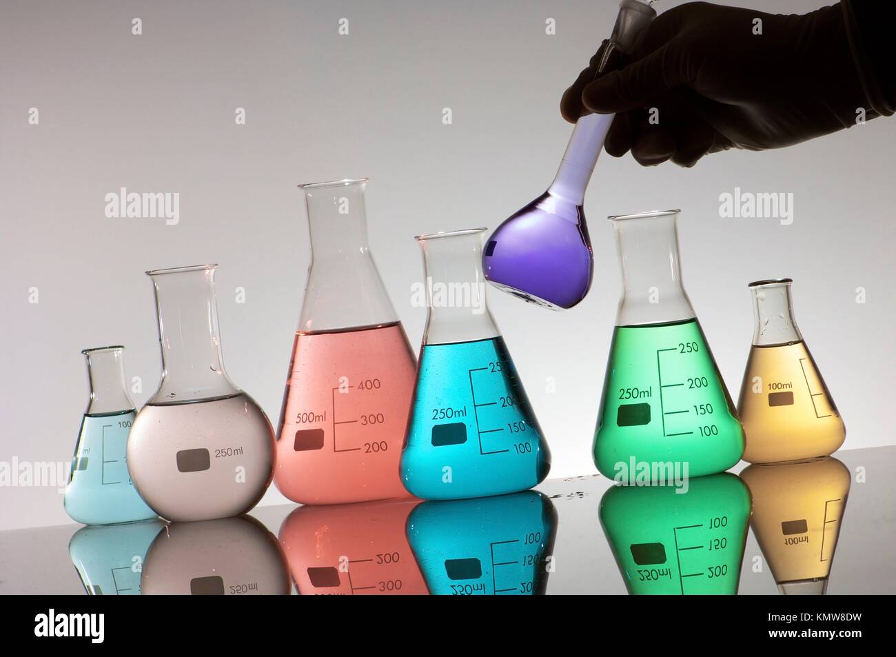 Yellow liquid in erlenmeyer flask hi-res stock photography and images ...