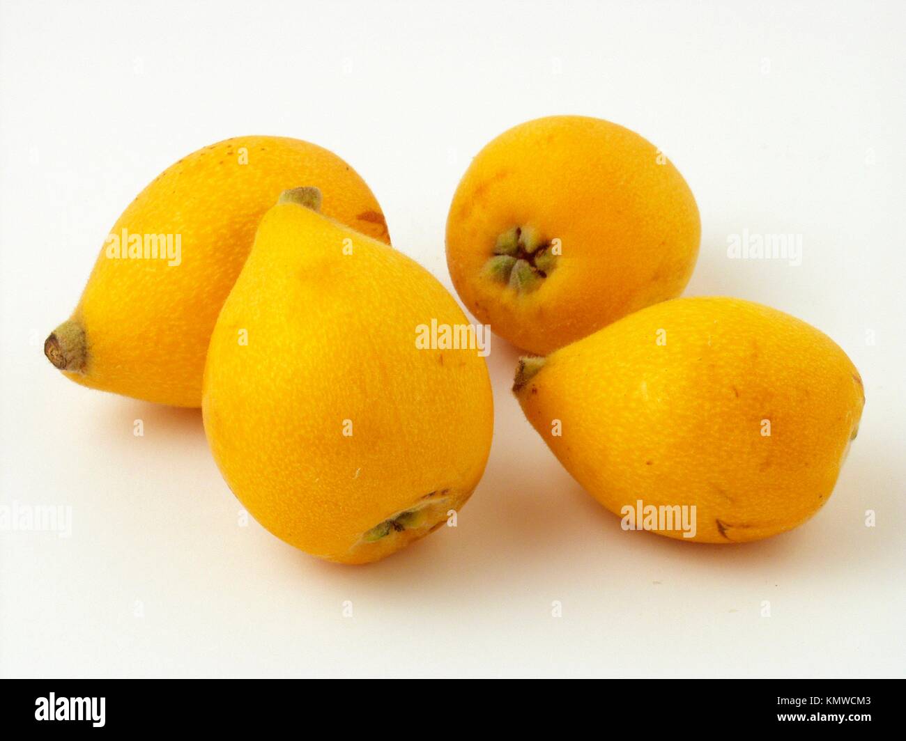 Eating loquat fruit hi-res stock photography and images - Alamy