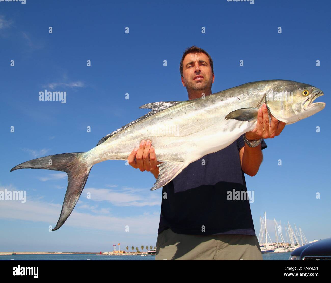 Fisherman holding catch Garrick Lichia Amia Leerfish Leervis fishJack ...