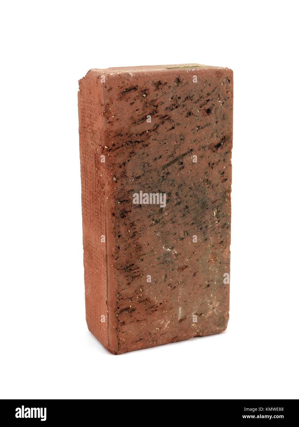 A red brick isolated against a white background Stock Photo - Alamy