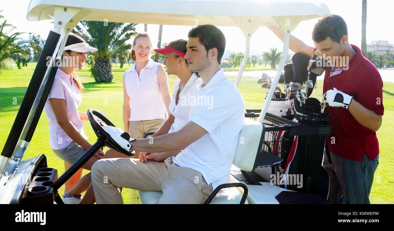 Golf course young team people group buggy green grass field Stock Photo ...