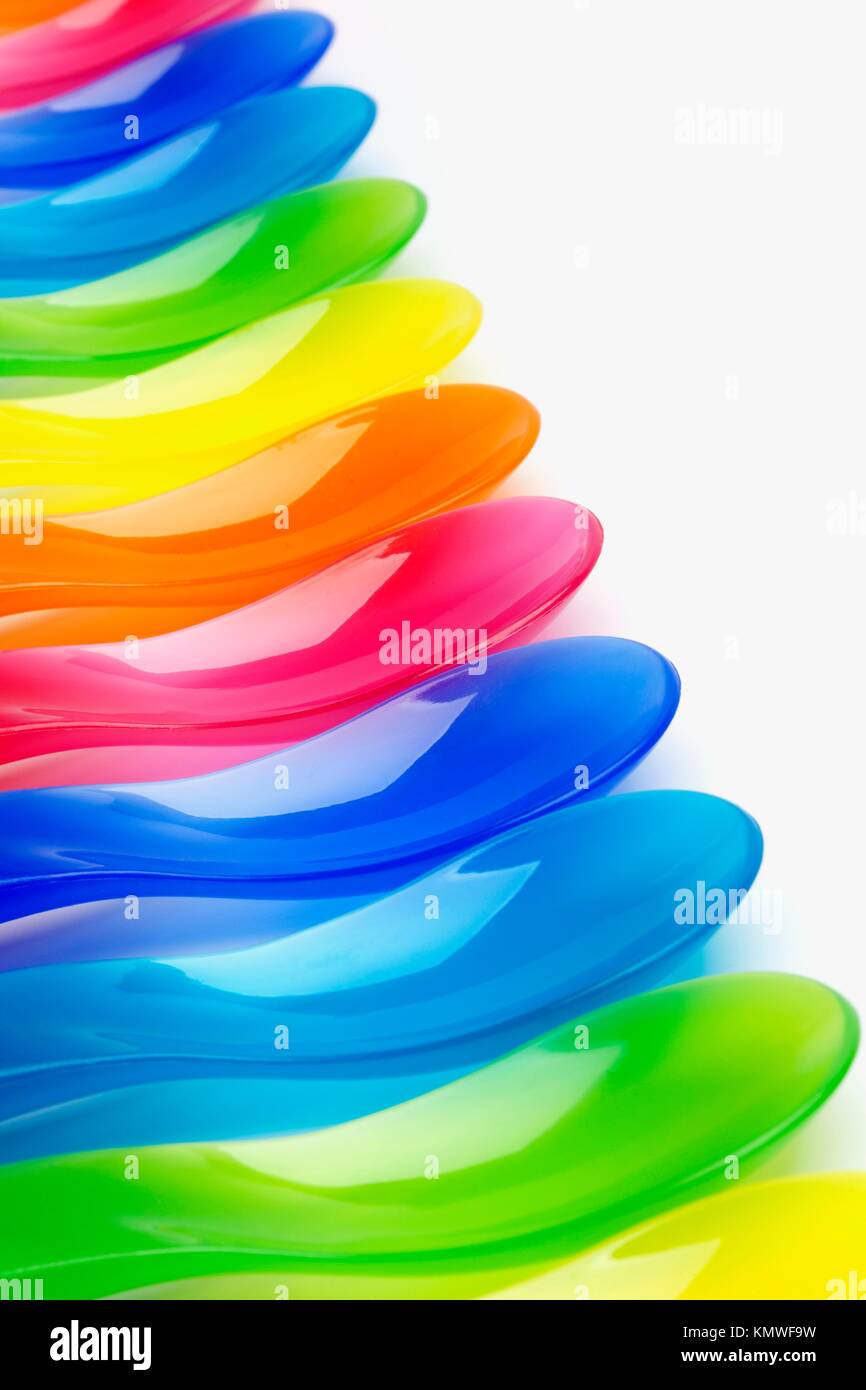 Rainbow plastic spoons hi-res stock photography and images - Alamy