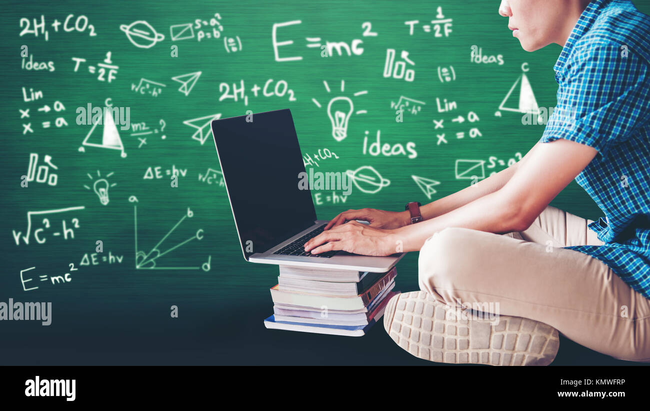 Students using laptop for research homework in college, education ...