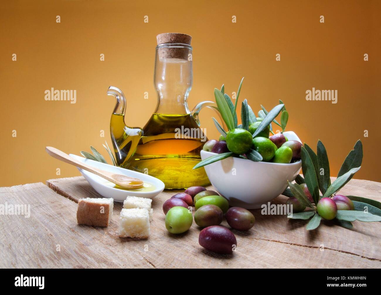 Tasting olive oil and freshly harvested olives Stock Photo - Alamy