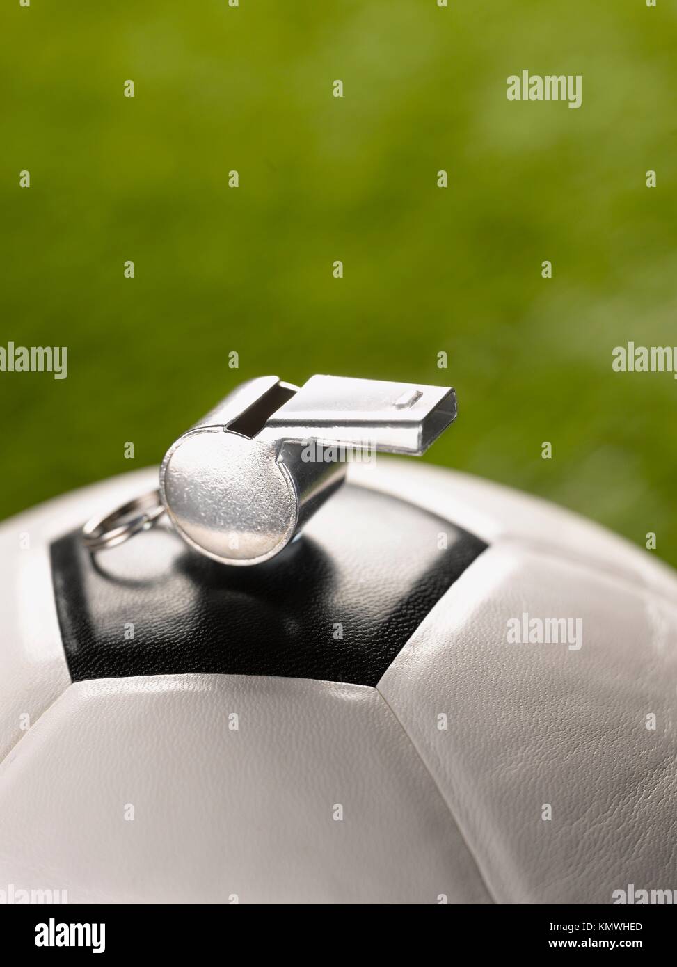 ball and whistle on soccer field Stock Photo - Alamy