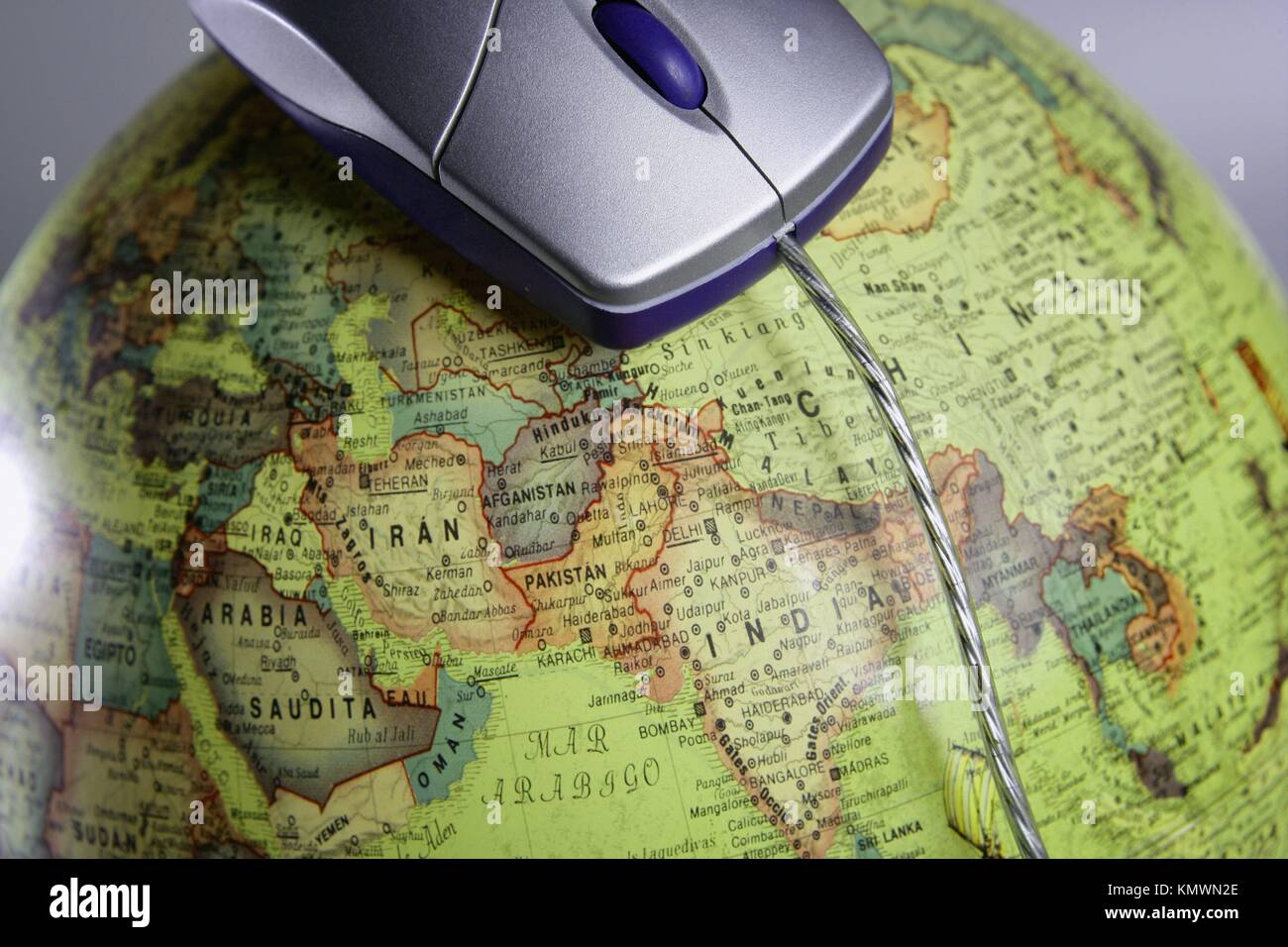 Computer wired mouse over the world colorful global earth map Stock ...